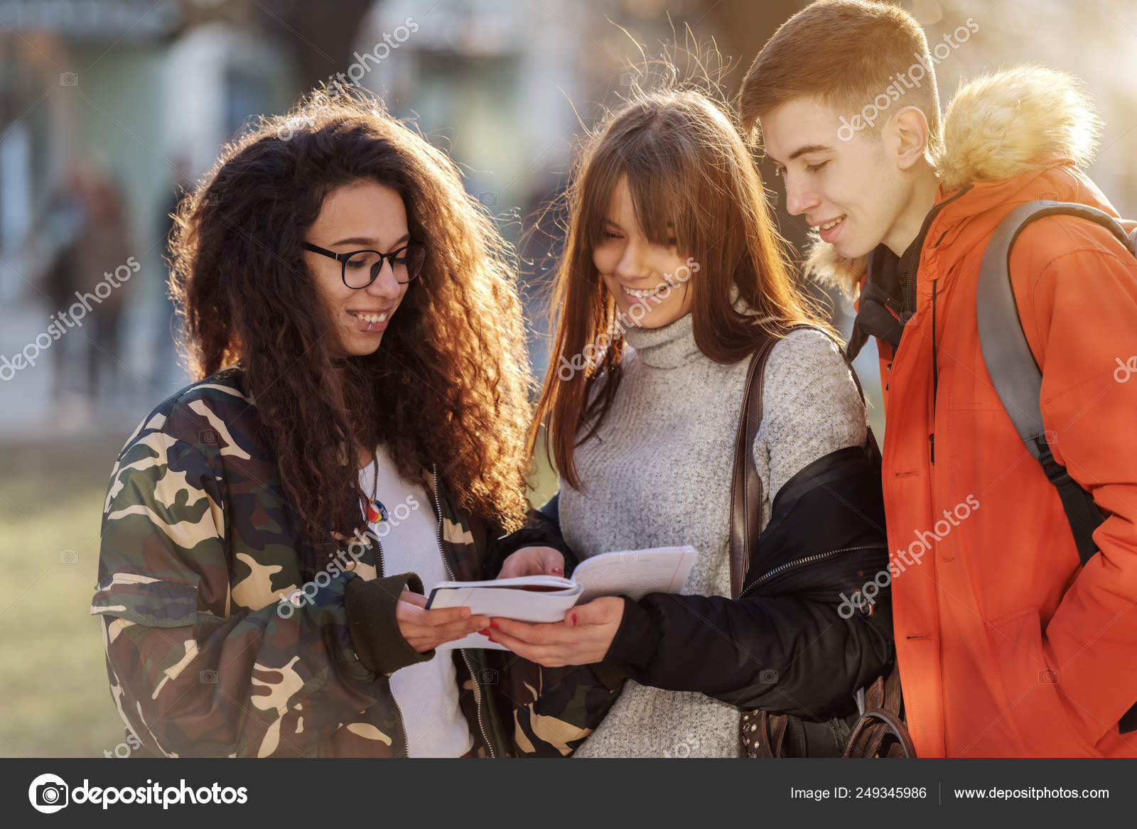 Three Happy Multicultural Classmates Standing Front School Looking ...