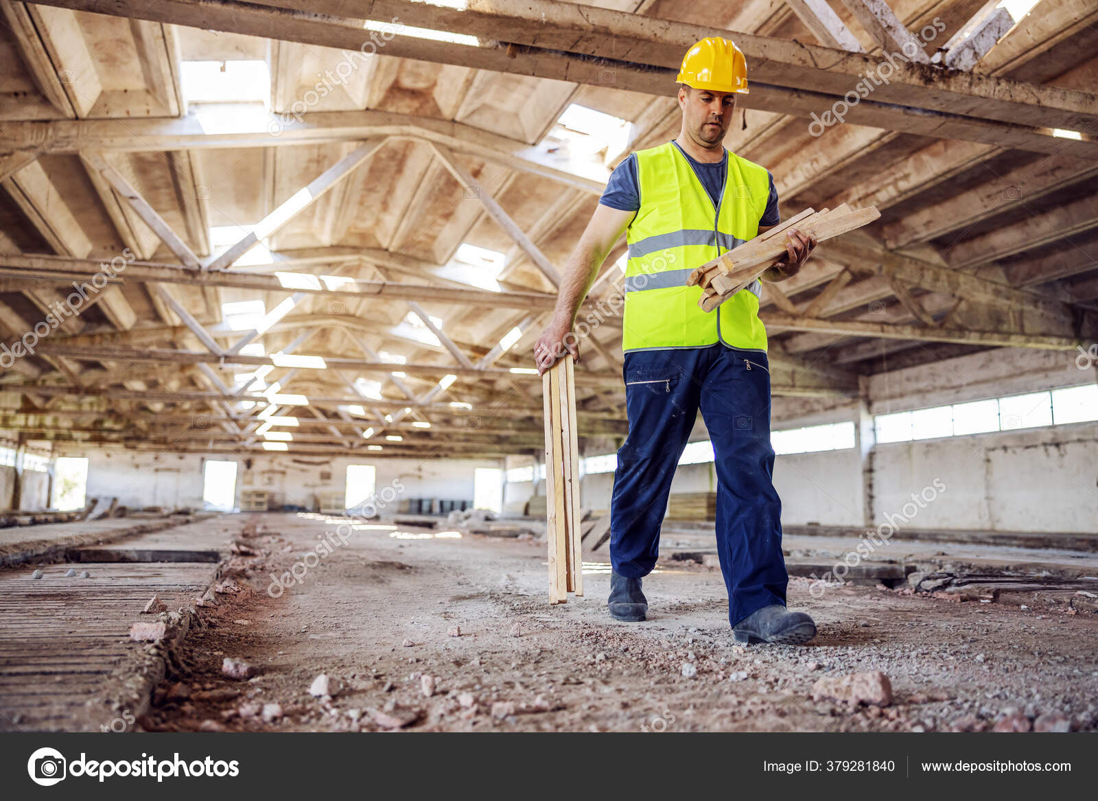Full Length Worker Relocating Joist While Walking Trough Construction ...