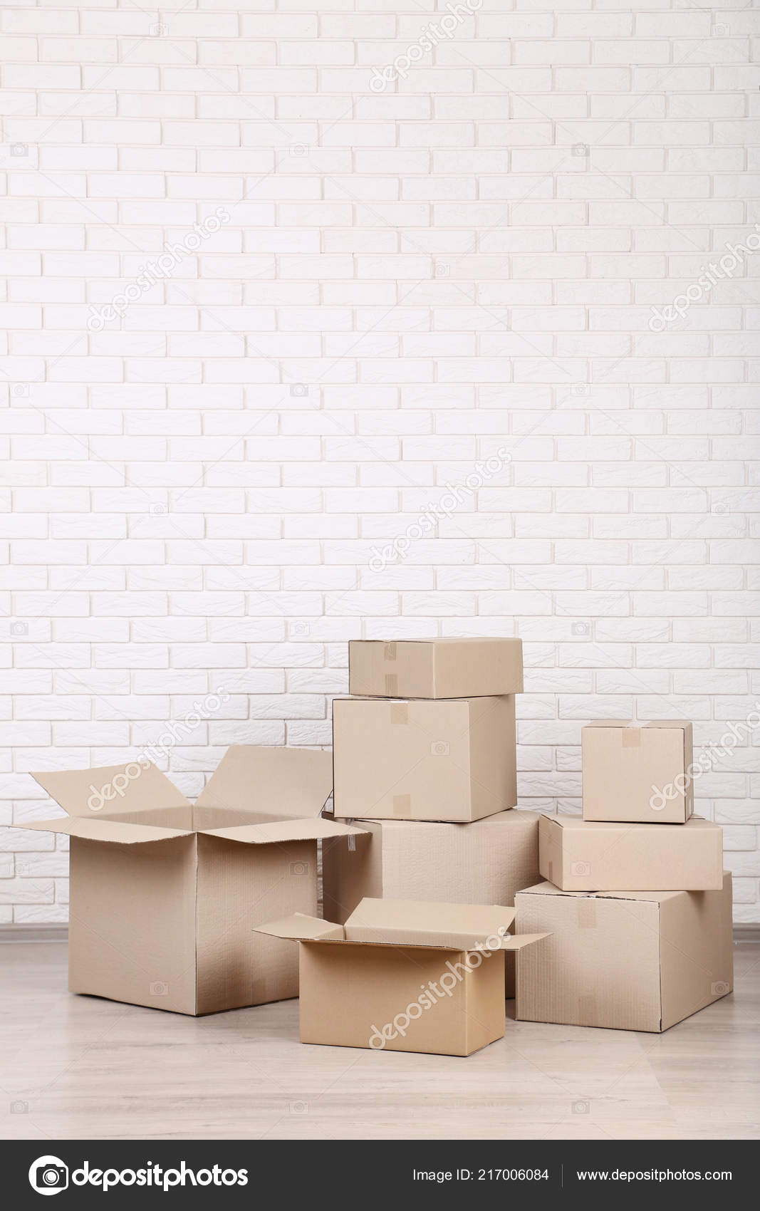 Cardboard Boxes Brick Wall Background Stock Photo by ©5seconds 217006084