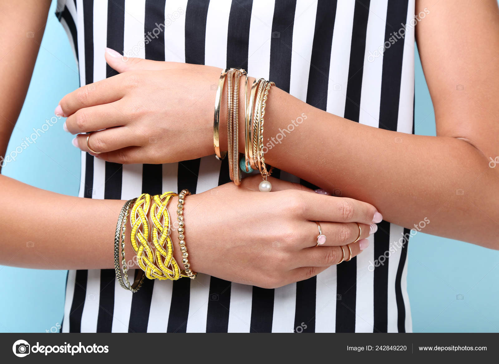 Beautiful Hands With Bracelets And Rings