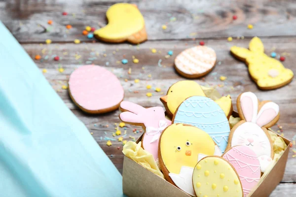 Easter gingerbread cookies in box on wooden table - Stock Image ...