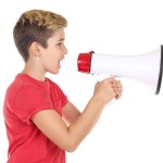 Young boy with megaphone isolated on white background Stock Photo by ...