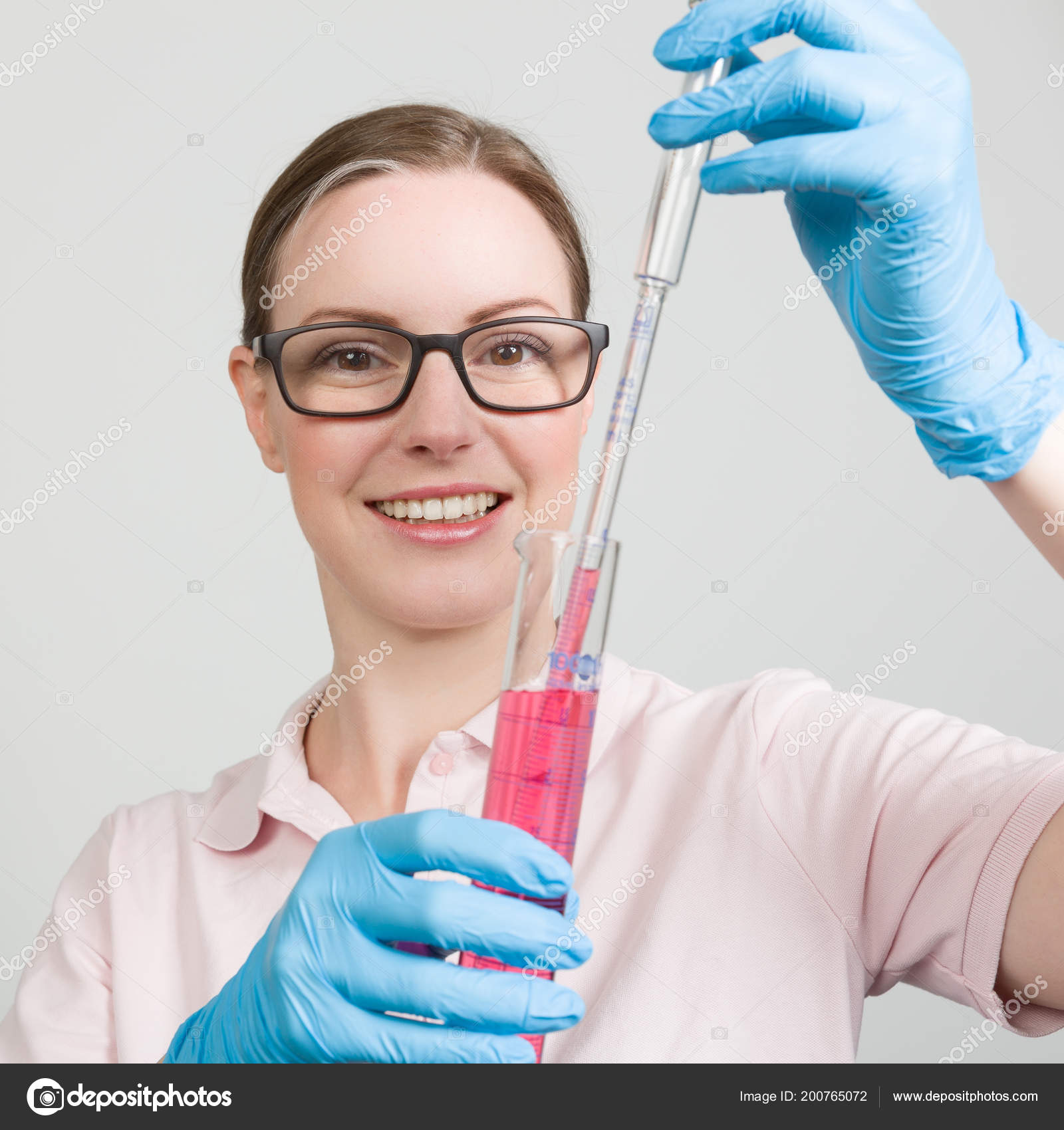 Scientist is measuring a liquid in a laboratory Stock Photo by ...