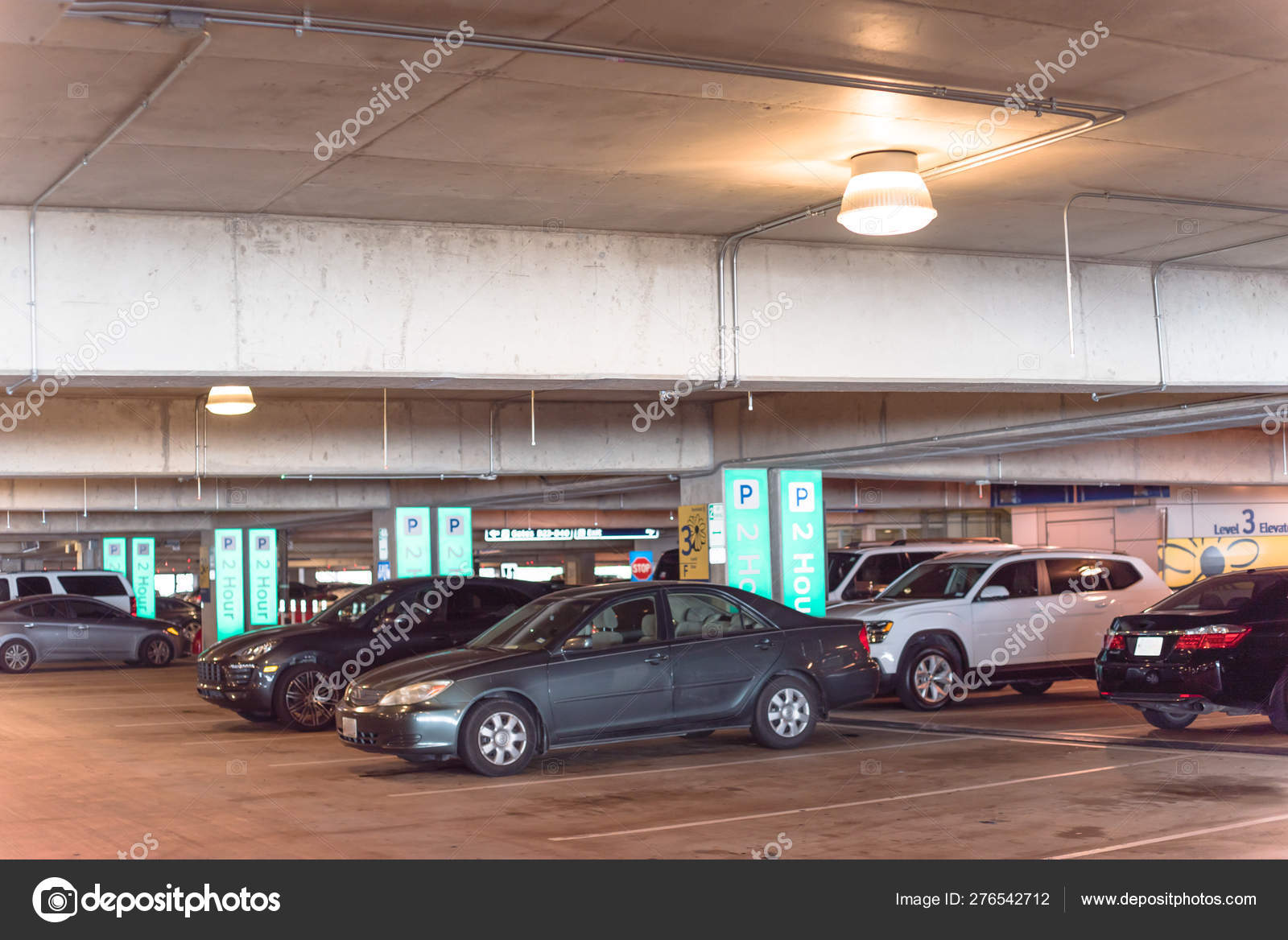 Overhead green or led indicators showing available parking spaces at ...
