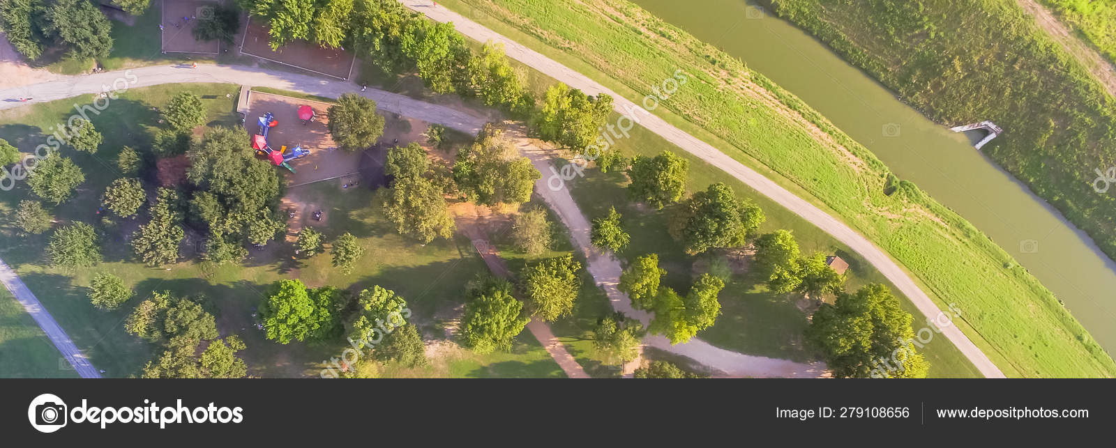 Panoramic top view city park with playground, trails and clean river in ...