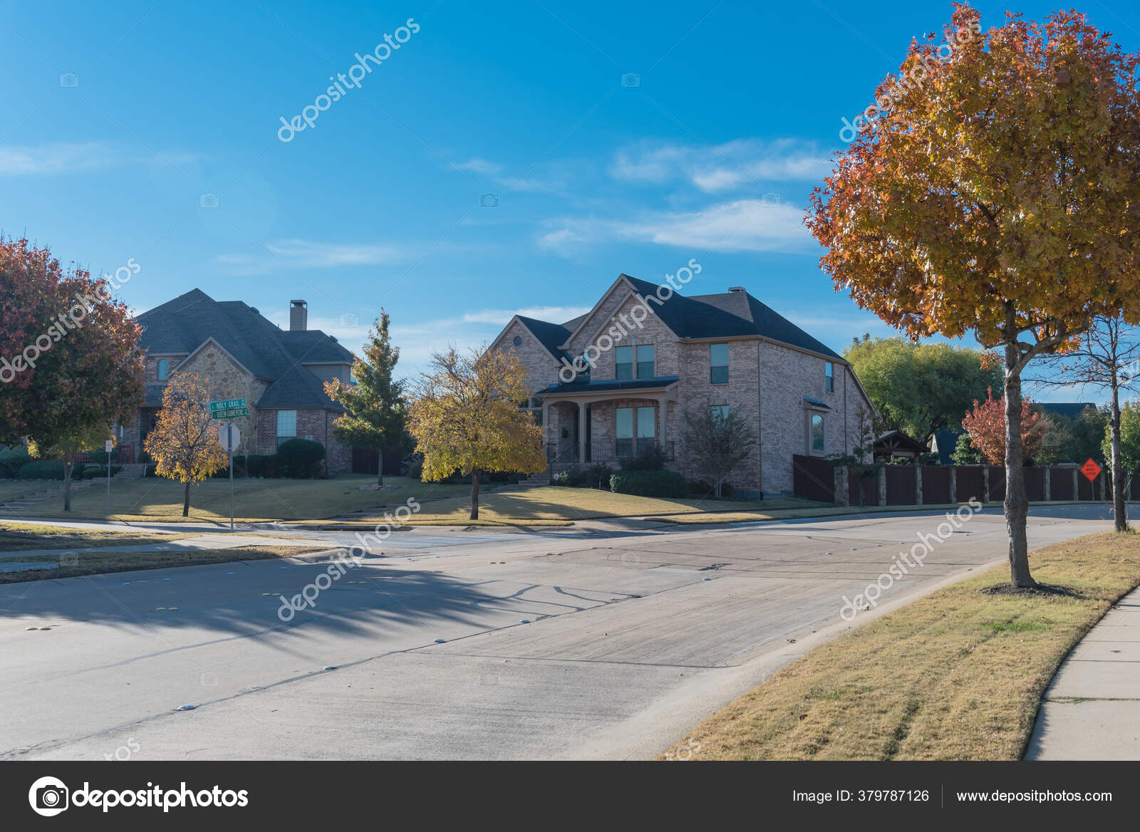 Quite new development subdivision with row of suburban houses and ...