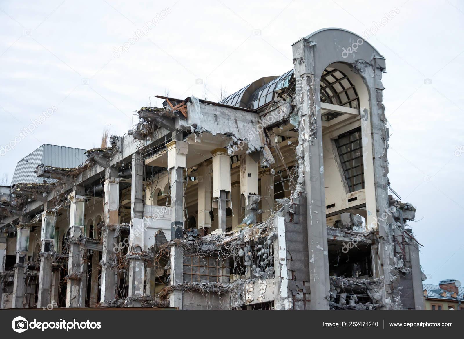 Destroyed building after demolition, man-made accident. The supporting ...