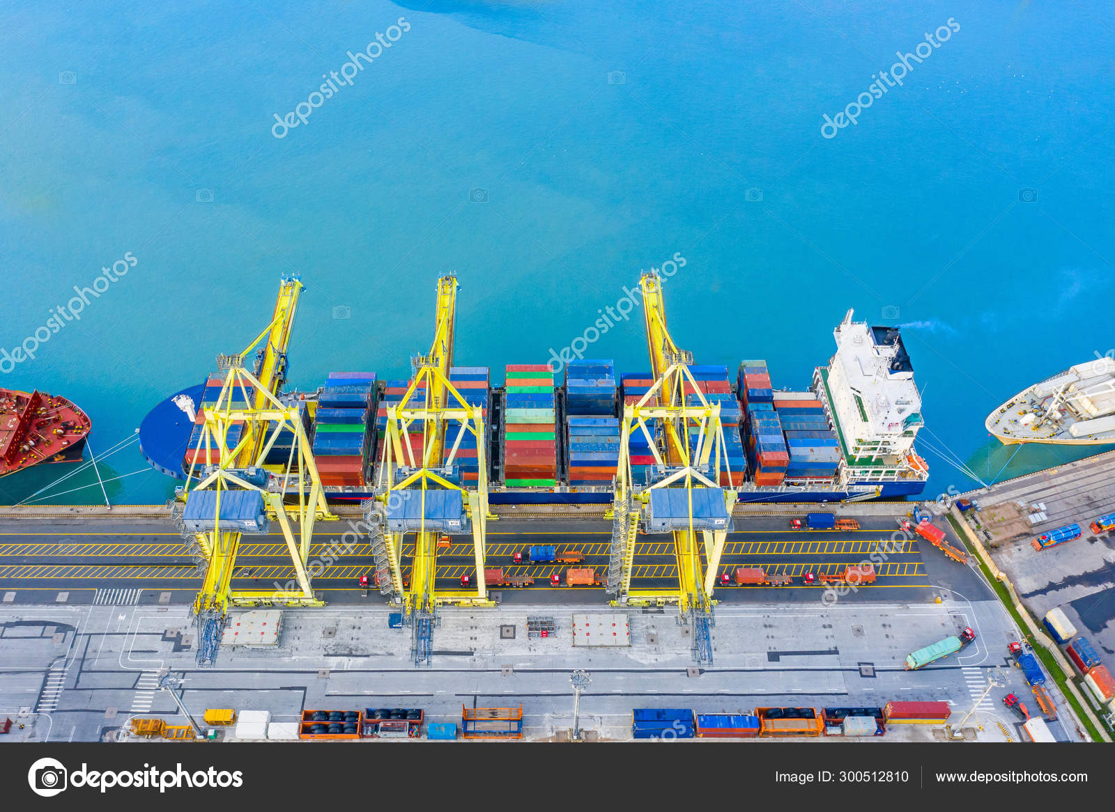 Large cargo ship maritime at the port is moored at the port, cranes ...