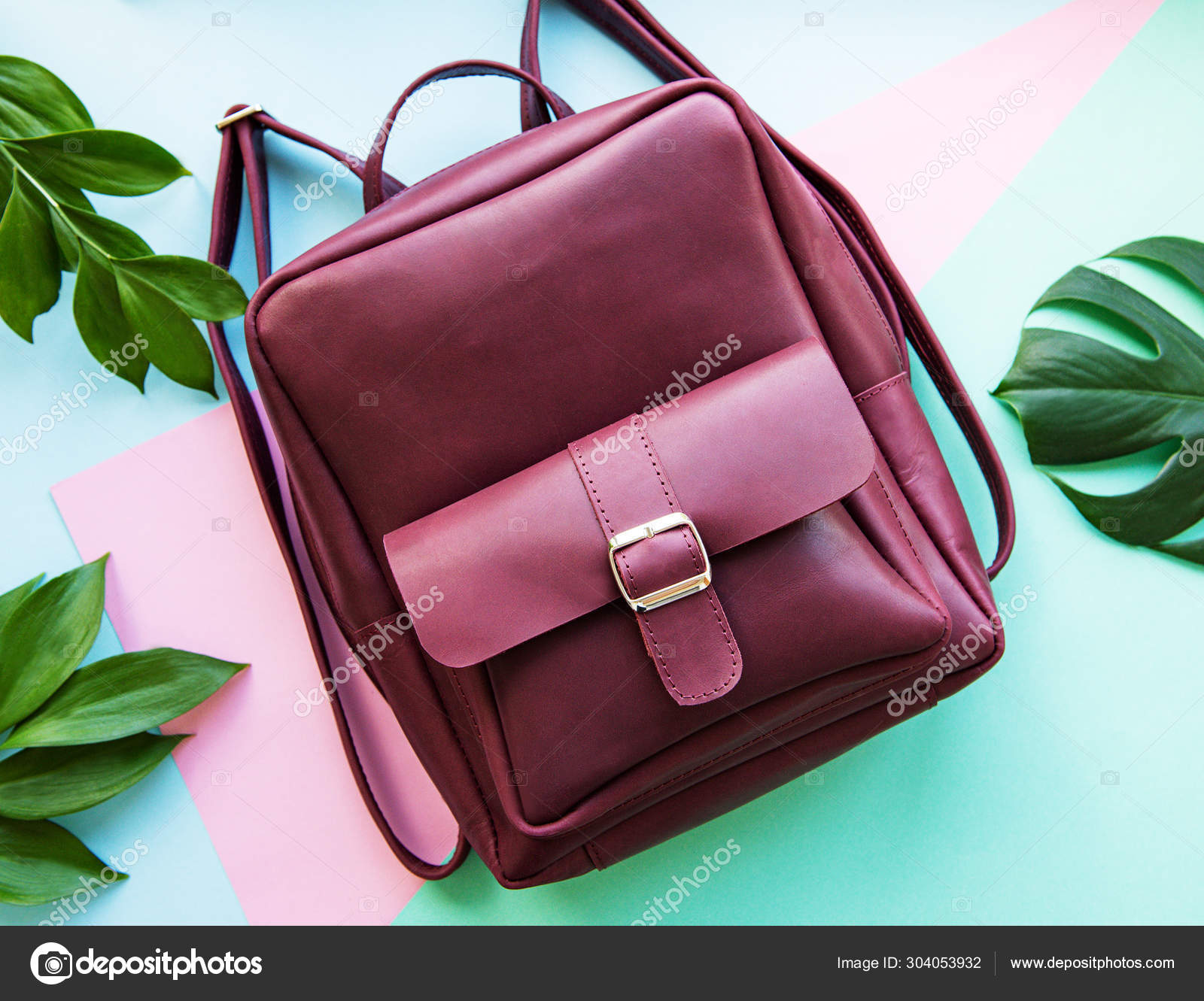 Burgundy leather backpack Stock Photo by ©Almaje 304053932