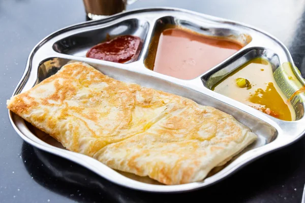 Roti prata Stock Photos, Royalty Free Roti prata Images | Depositphotos