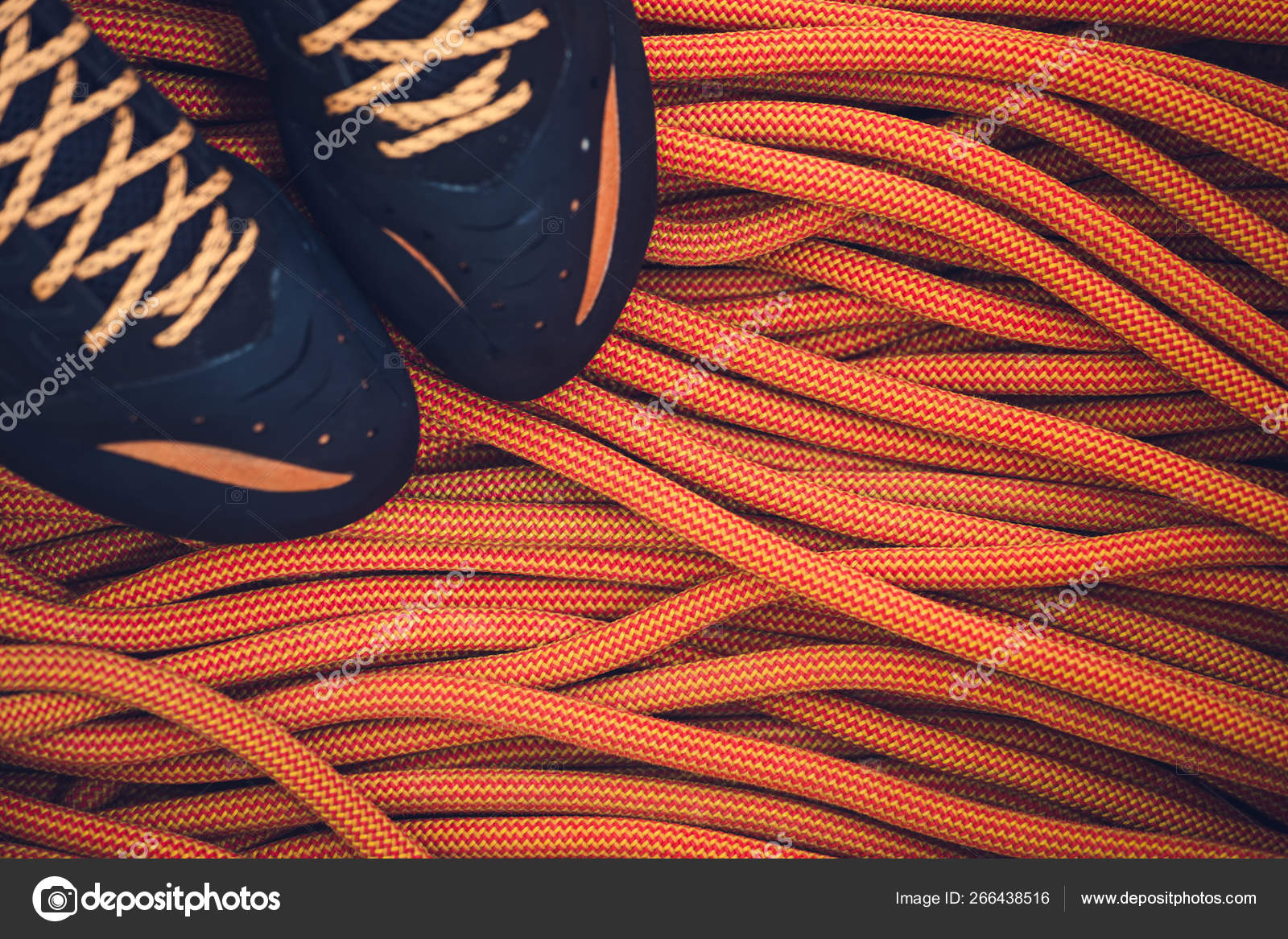 Rope and climbing shoes. — Stock Photo © zhukovvvlad #266438516