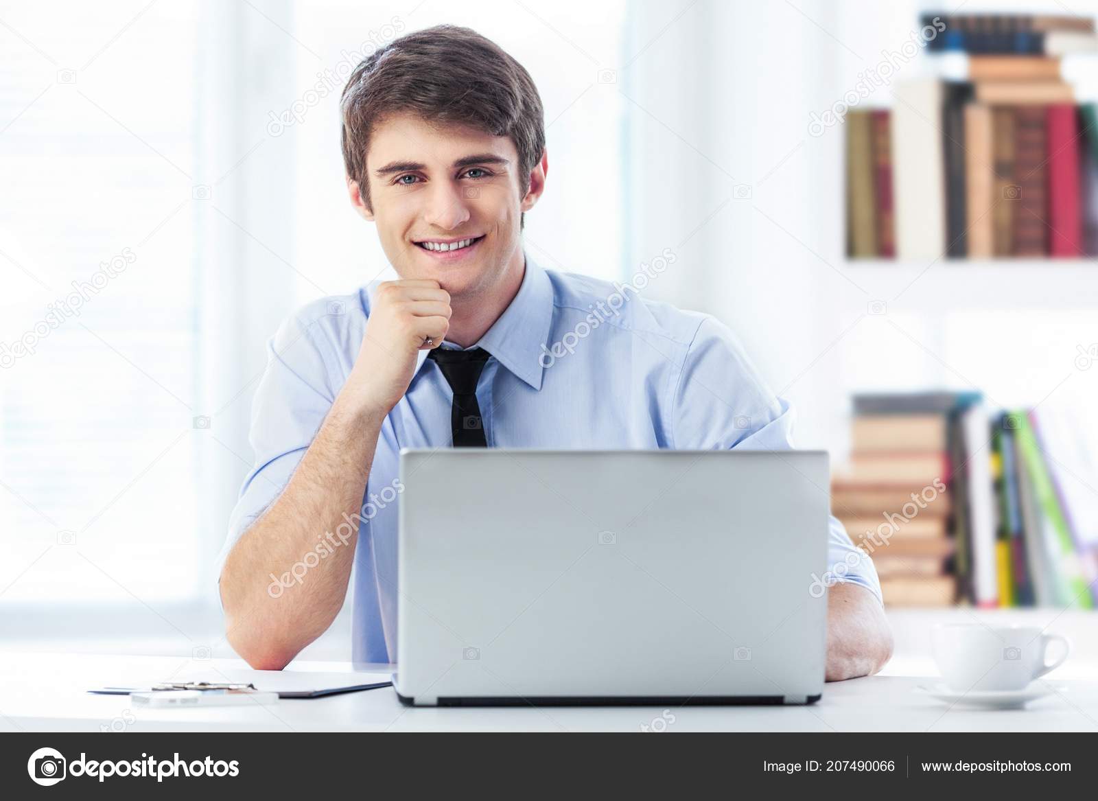 Happy businessman working at the office on laptop Stock Photo by ... Happy businessman working at the office on laptop Stock Photo by ...