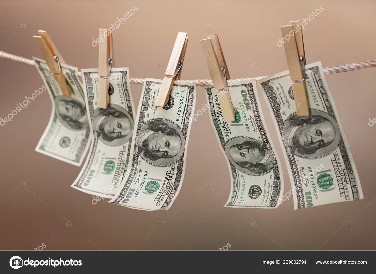 American dollars in a rope Stock Photo by ©billiondigital 229002794