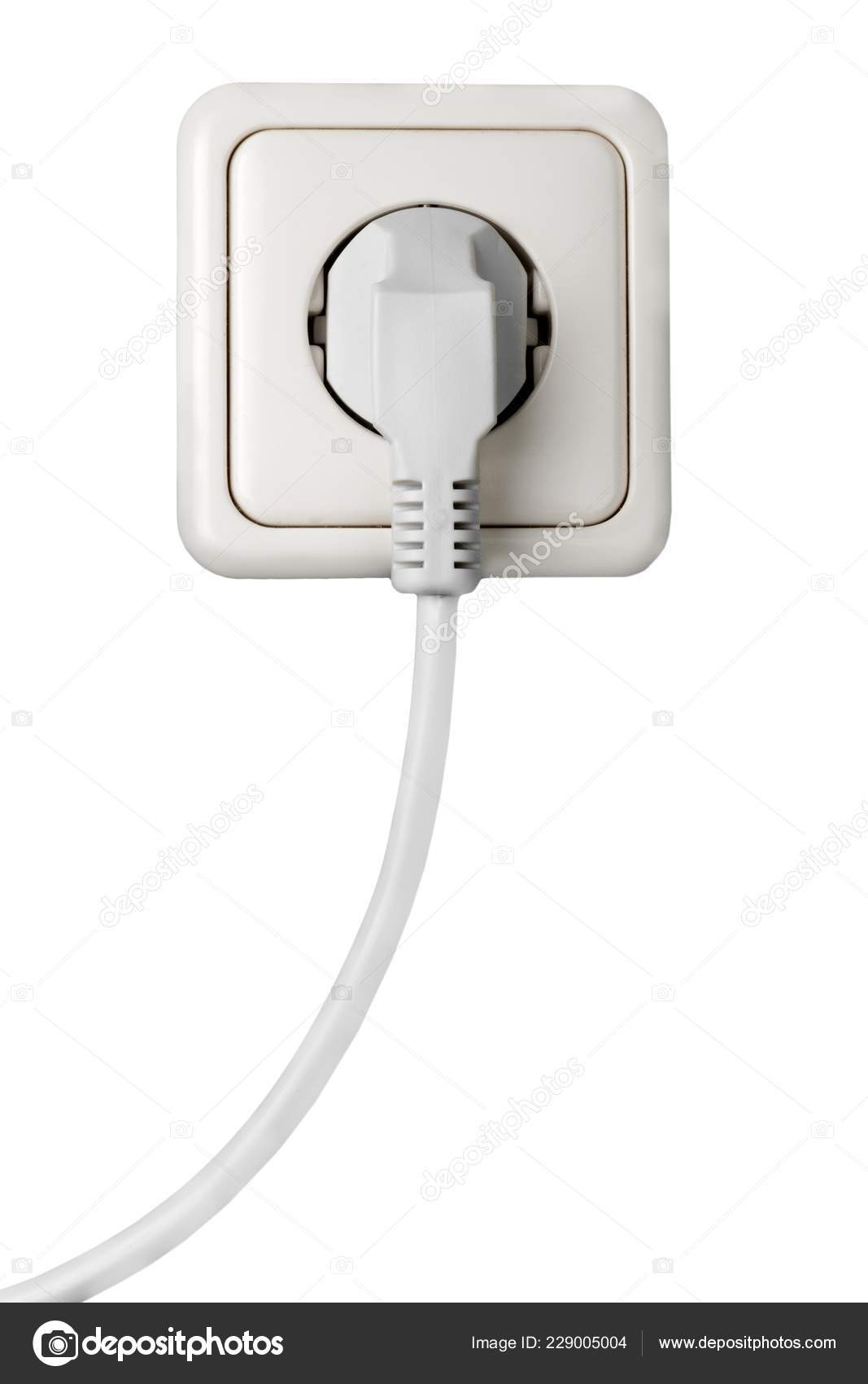 White electrical plug in the electric socket — Stock Photo ...