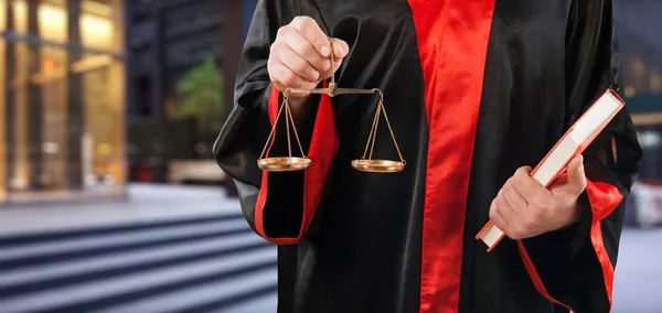 Judge with scale at courtroom — Stock Photo © billiondigital #161299454