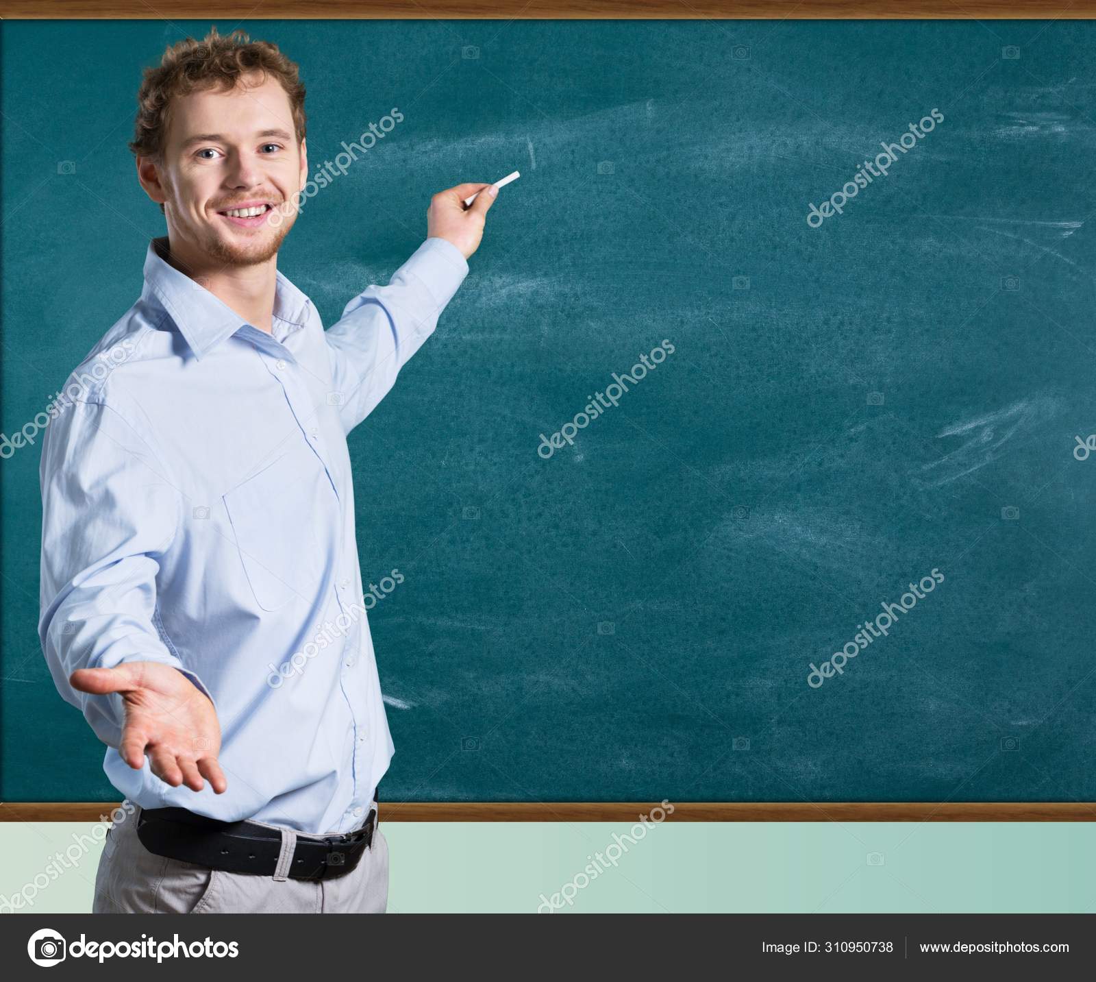 Young Male Teacher Standing Greenboard Stock Photo by ©billiondigital ...