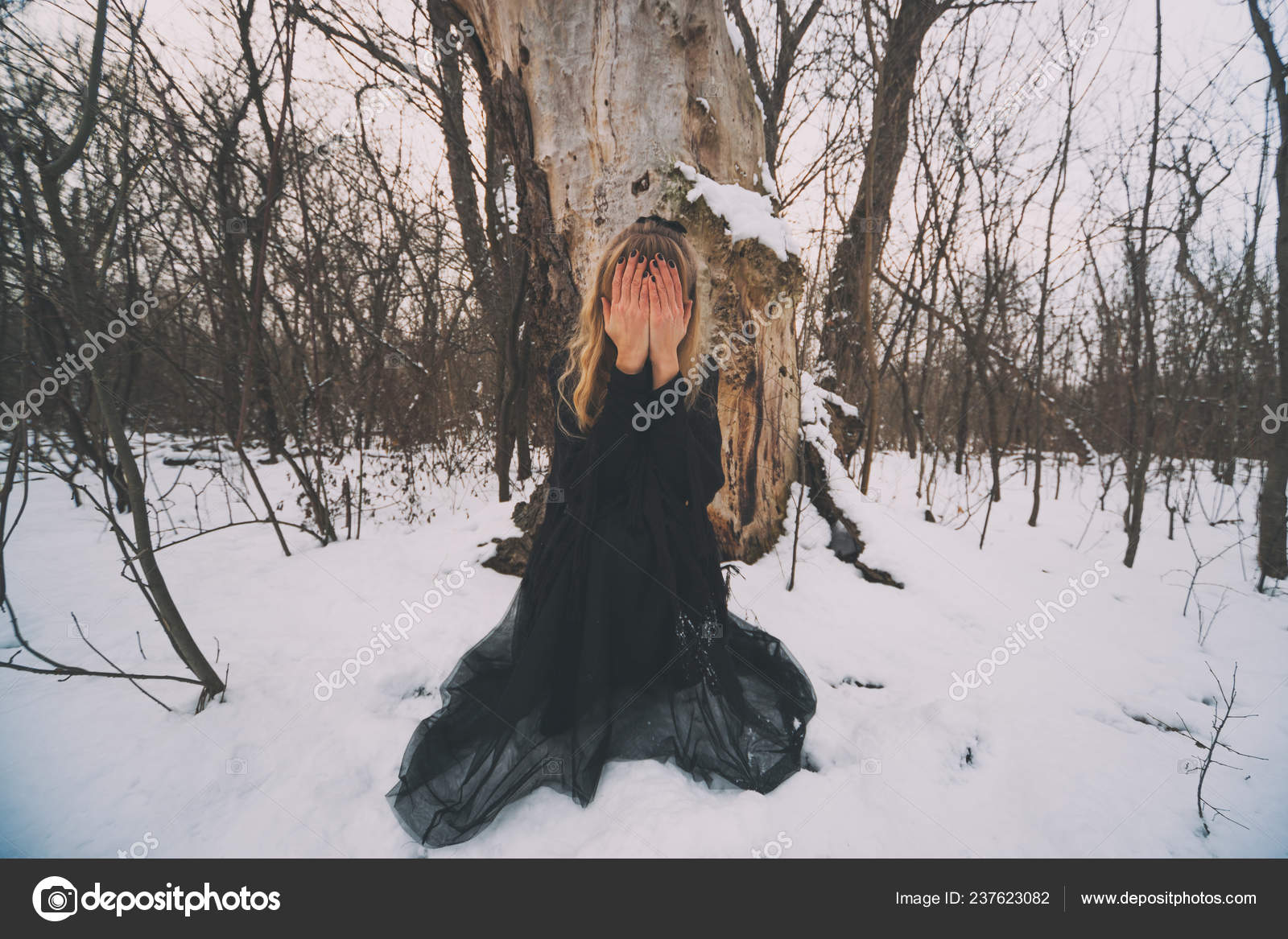 Woman Kneeling Crying