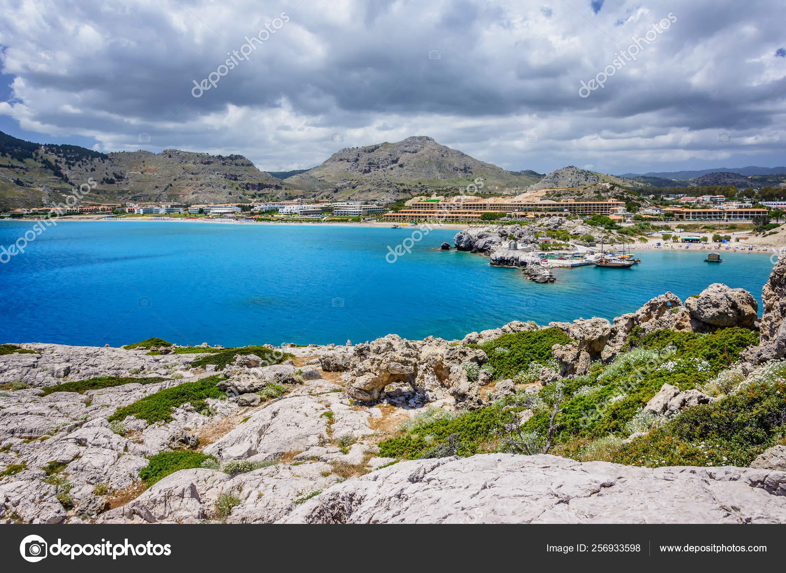 Kolymbia beaches with the rocky coast and bright sea in Rhodes island ...