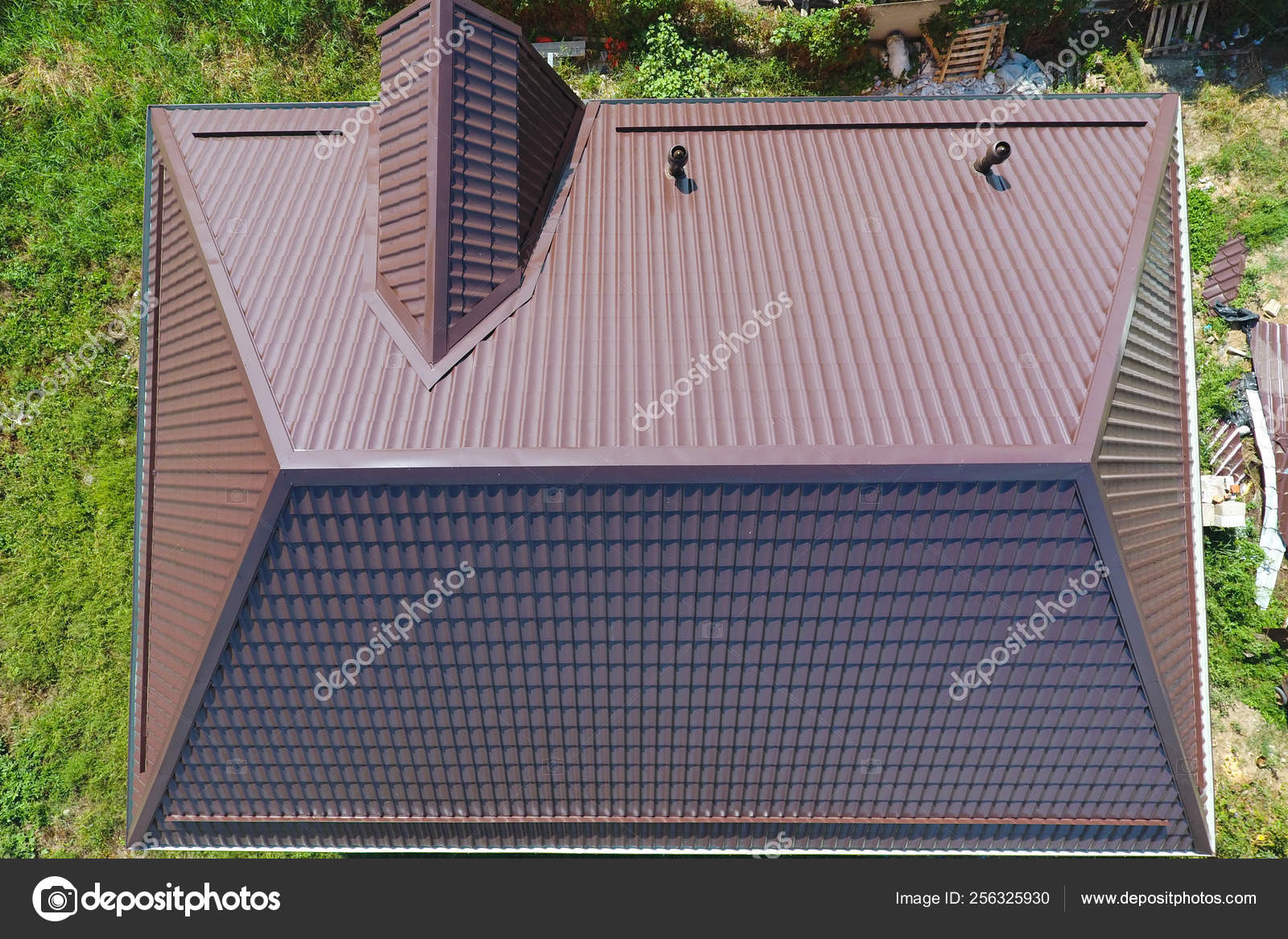 A view from above on the roof of the house. The roof of corrugated ...