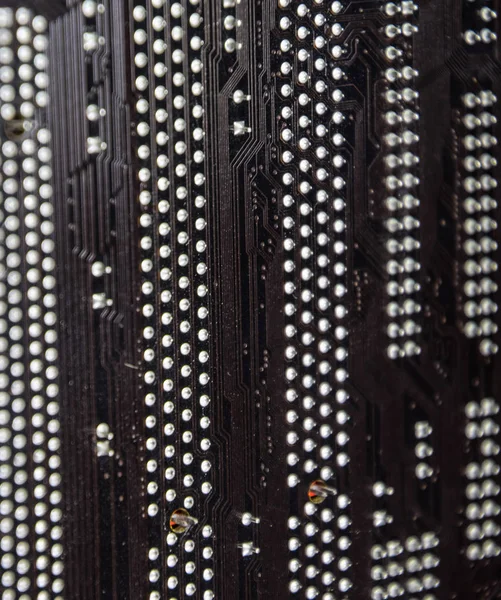 The reverse side of the microboard. Contacts solder. Soldered parts ...