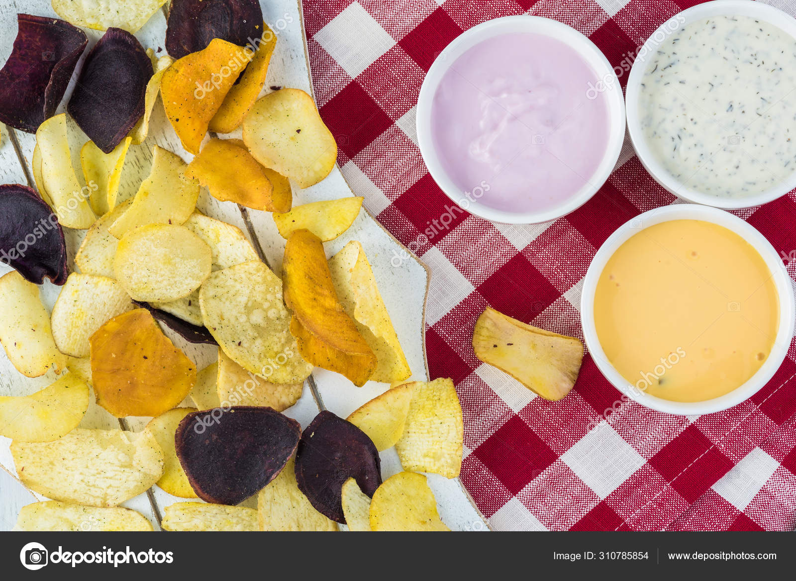 Colorfull mixed exotic roots chips and assorted healthy dips. — Stock ...