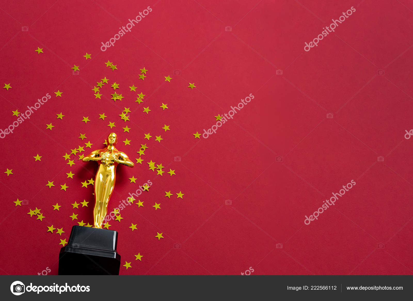 Gold Statue Trophy Stars Confetti Red Background Stock Photo by ...