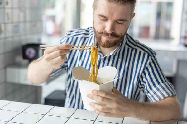 Man eating chinese food Stock Photos, Royalty Free Man eating chinese ...