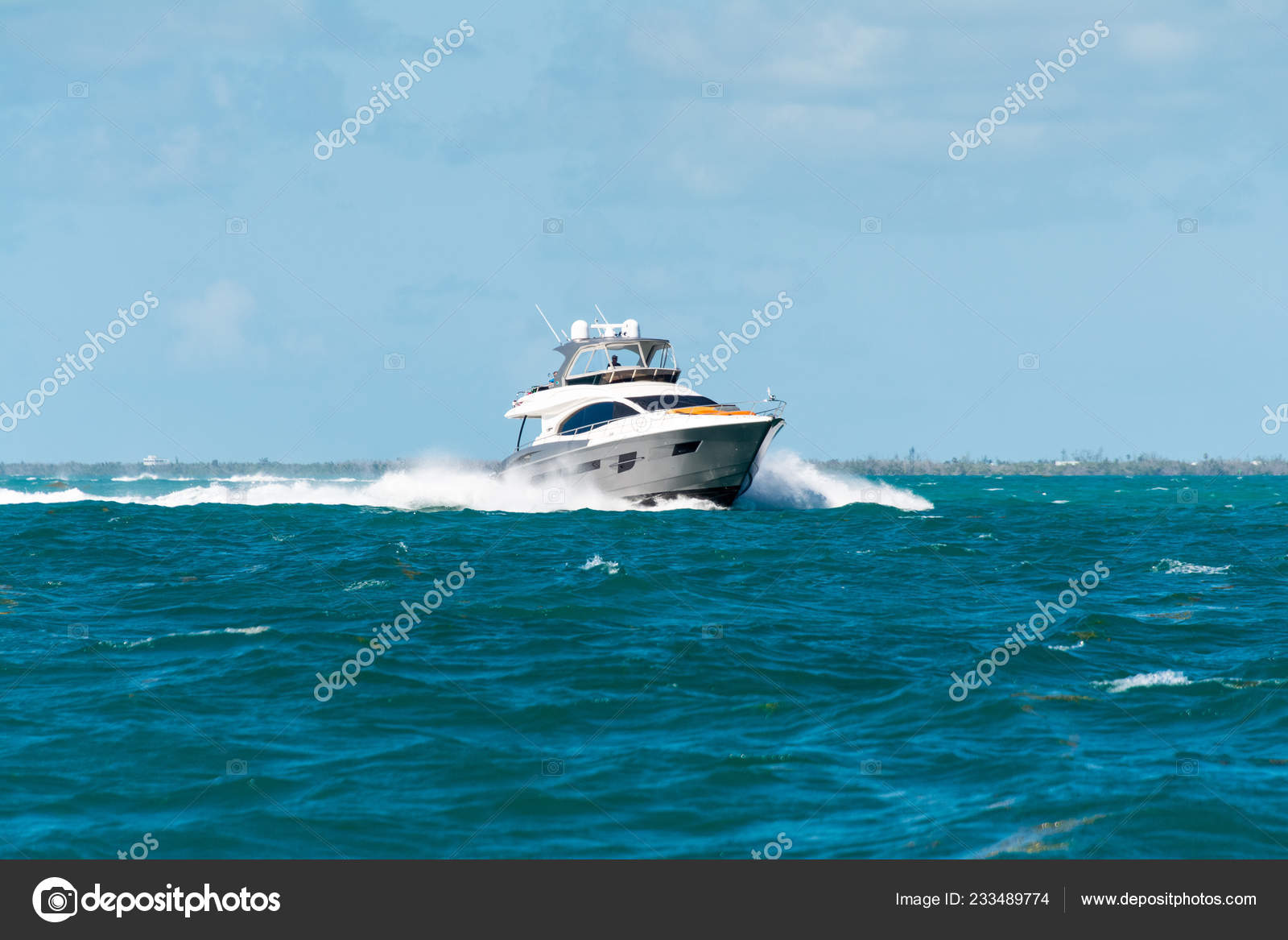 White Luxury Motorboat Breaking Bow Waves While Cruising Florida Keys ...