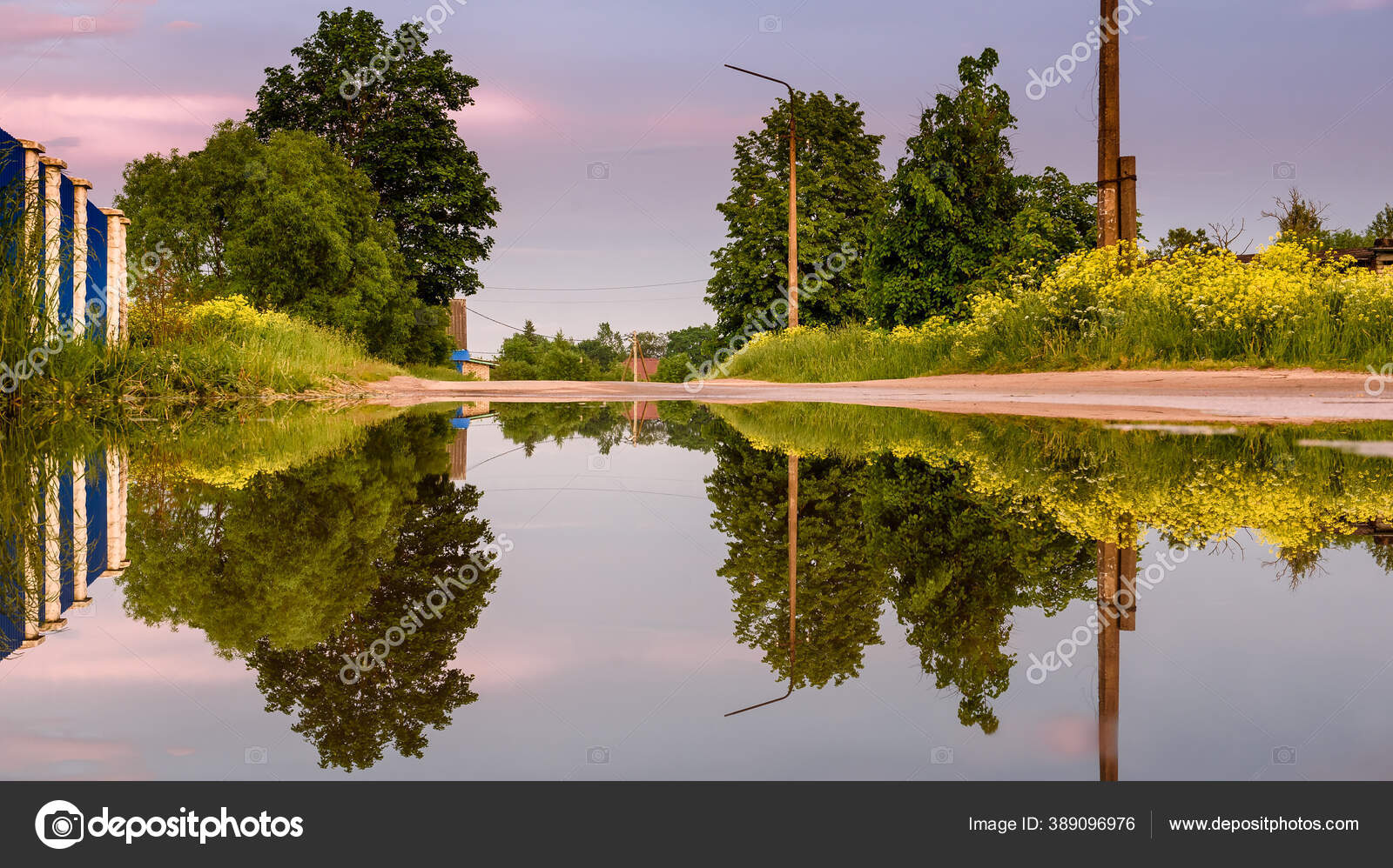 Beautiful Sunset Its Reflection Puddle — Stock Photo © kulkann #389096976
