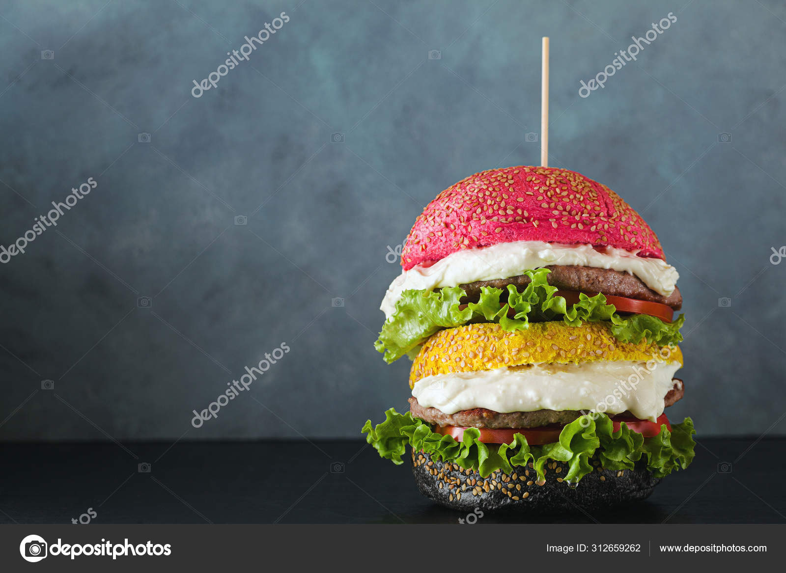 Big hamburgers with different colors bread buns in red , yellow Stock ...