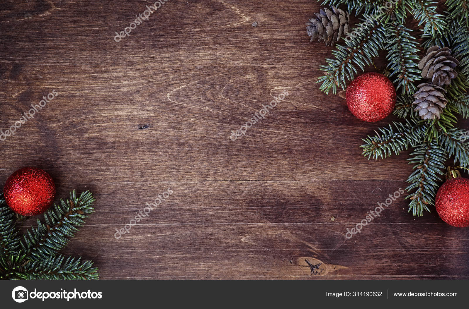 New Year's background. Spruce branches on a wooden table. Orname Stock ...