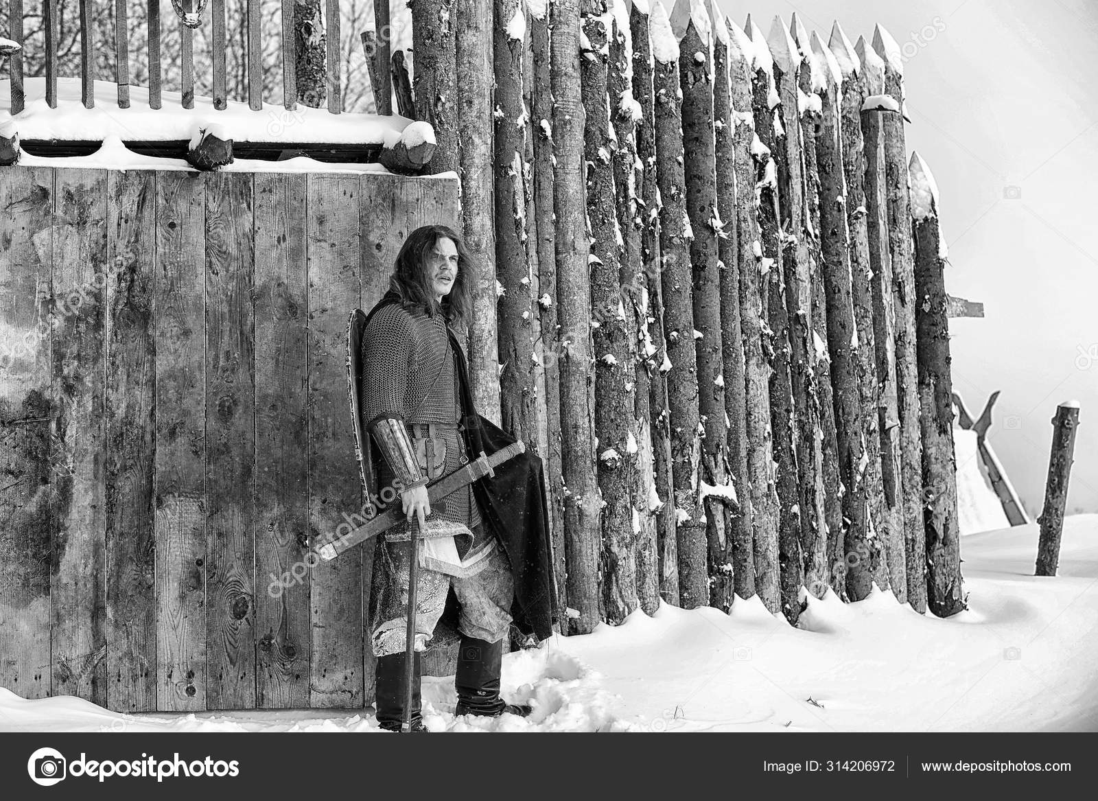 Defender the young warrior in armor — Stock Photo © alexkich #314206972