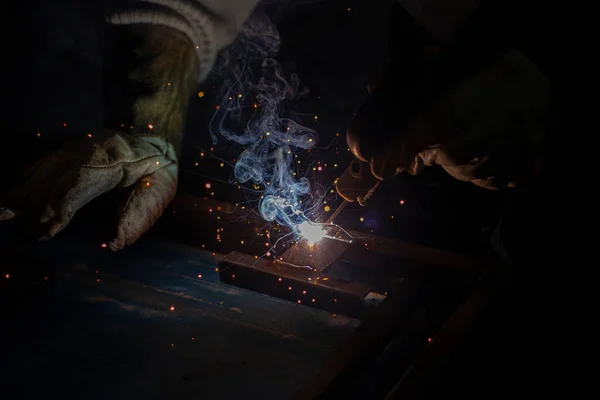 Metal welding. Heat. The work of a welder in a workshop. - Stock Image ...