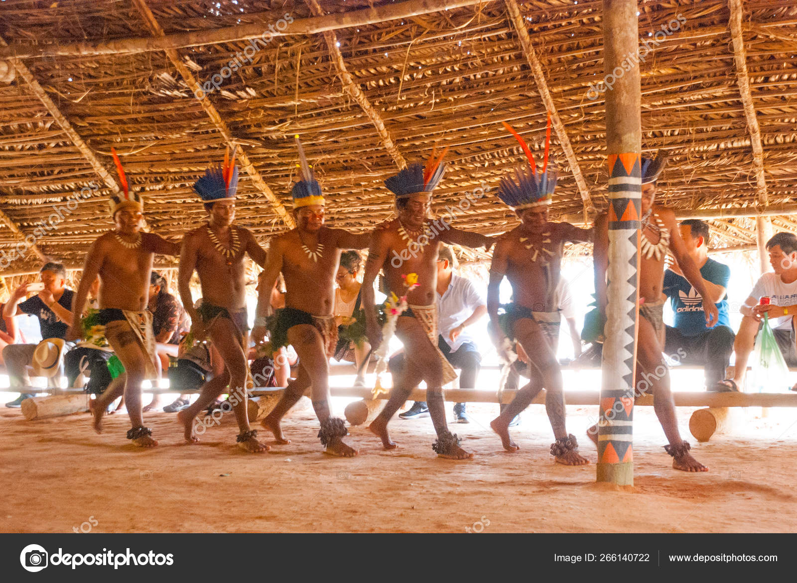 Tribes on the Amazon river in Brazil dancing for tourists. Amazon river ...