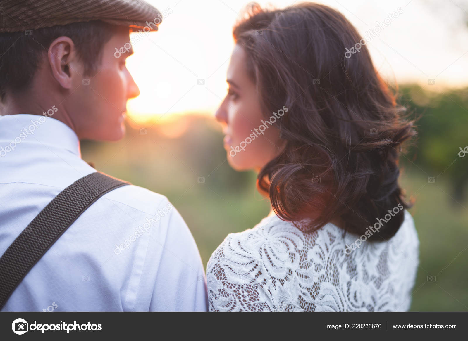 Young Couple Have Got Marriage In Rustic Style In Field Stock Photo by ...