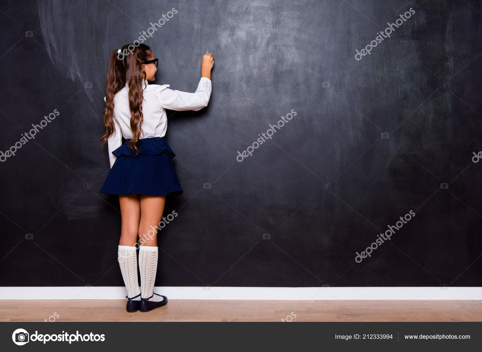 Back rear view of nice genius adorable small little girl with cu ...