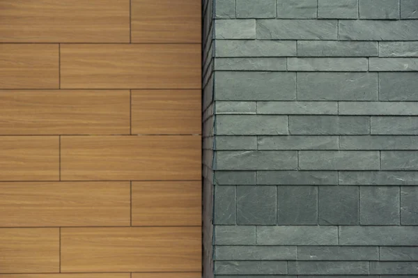 Modern finishing materials in construction. Facing tile on the facade ...