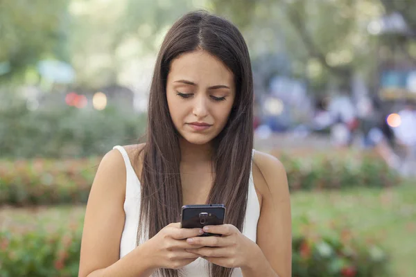 Attractive teenage girl receiving a surprising text — Stock Photo ...