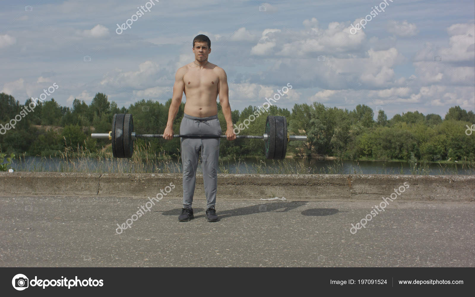 Bodybuilder doing barbell weight workout deadlift with heavy bar Stock ...