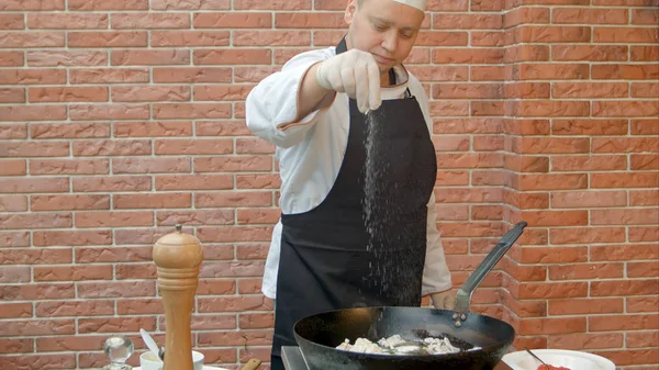 Chef pouring salt Stock Photos, Royalty Free Chef pouring salt Images ...