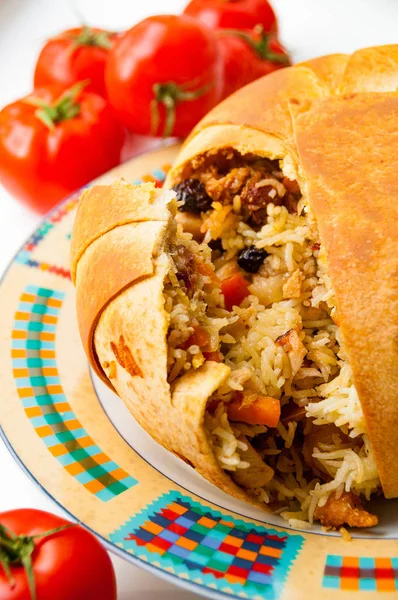 Shah pilaf. Khan pilaf in a pita. Traditional oriental dish . on ...
