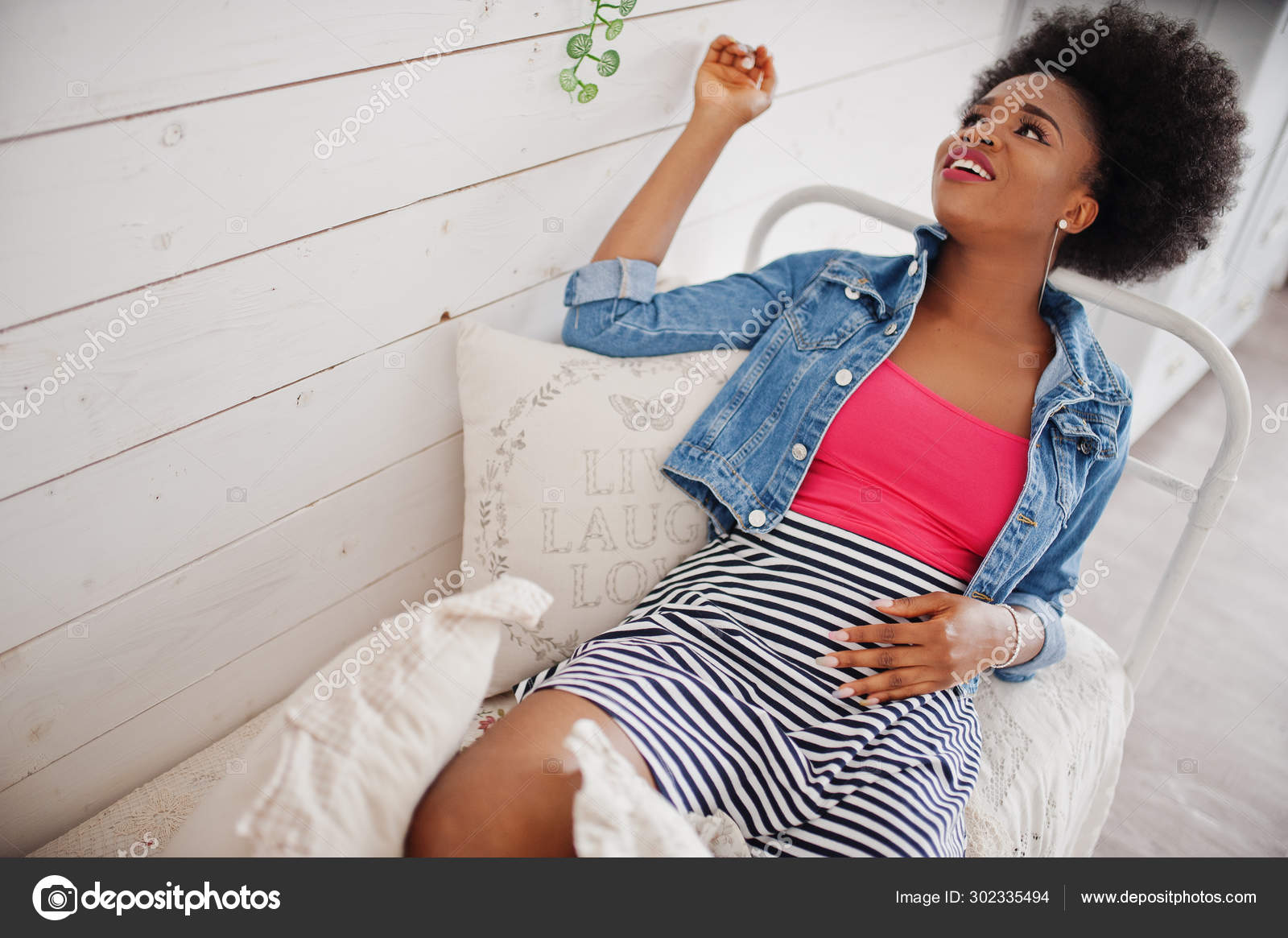 Attractive African American Woman With Afro Hair Wear On Skirt A