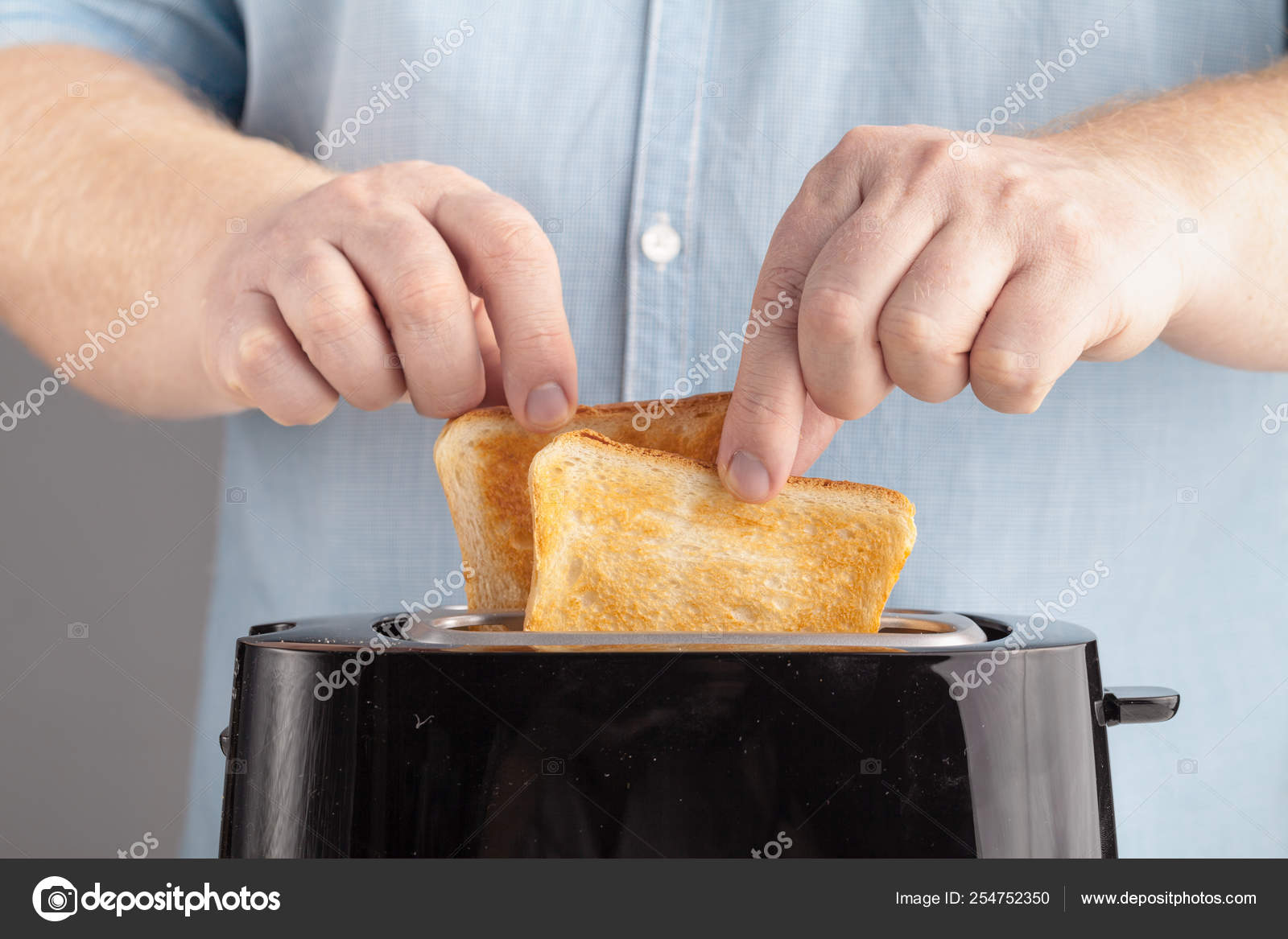Close up of an white man making toasts at the kitchen — Stock Photo ...