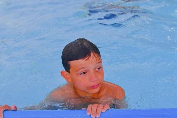 Boy lying pool Stock Photos, Royalty Free Boy lying pool Images ...