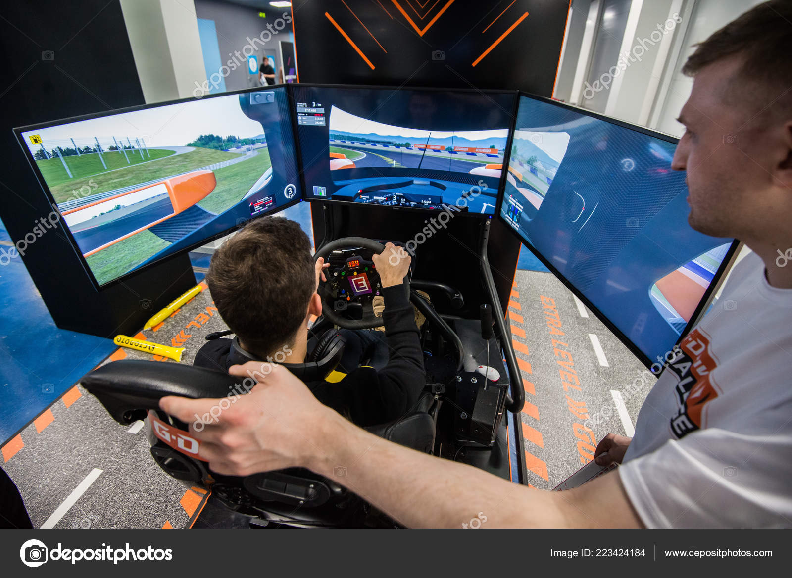 Man Playing Arcade Car Game