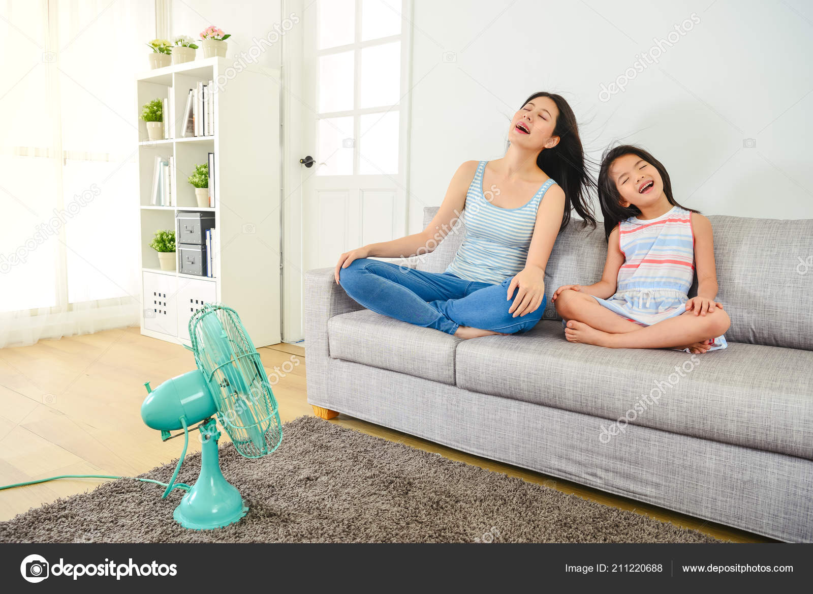 Mom Child Feeling Relief Hot Weather Sitting Sofa Together Closing ...