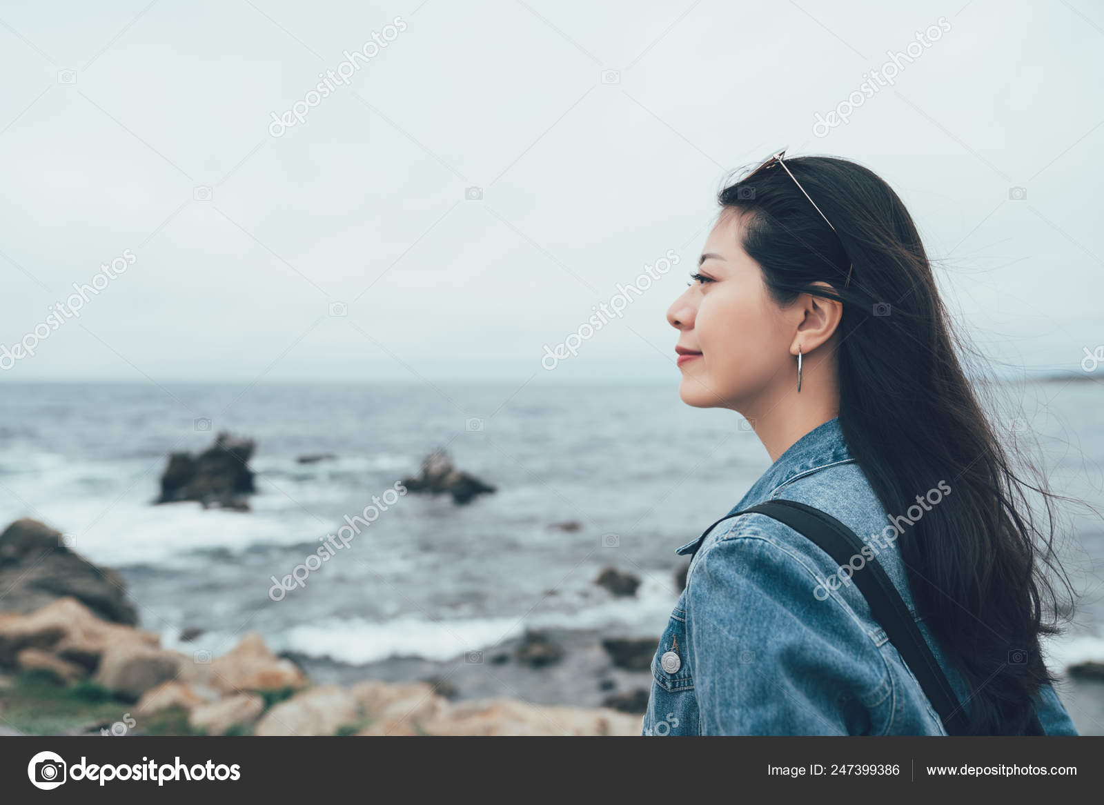 Sad Girl Standing On Cliff