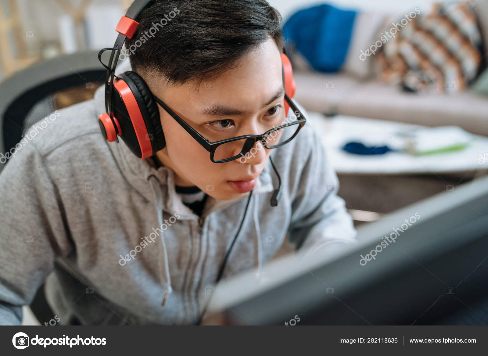 Handsome male teenager playing computer game — Stock Photo ...