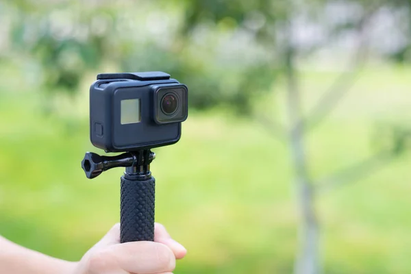Action camera on a stick from the front. Close-up. - Stock Image ...