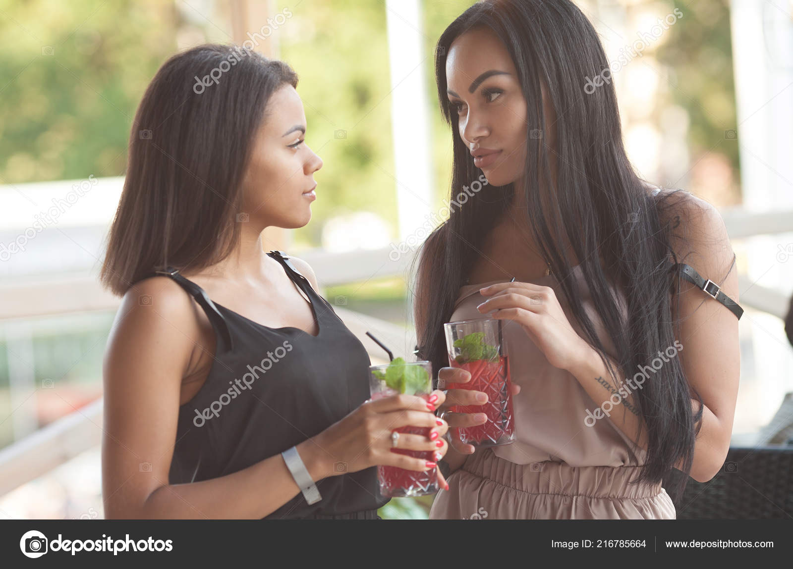 Female Couple Have Postive Expressions Sit Close Each Other Cafeteria ...